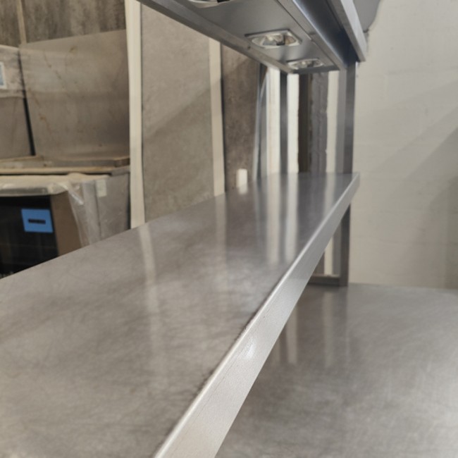 Pass though table with heated lamps